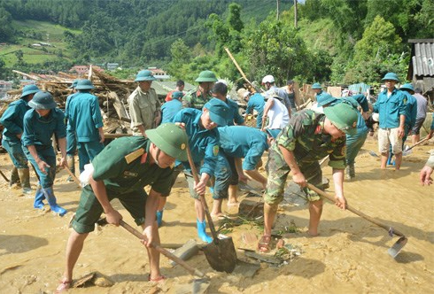 Troops help people overcome natural disaster consequences
