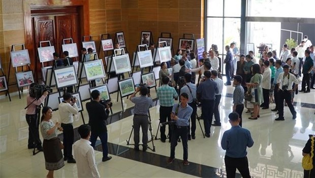 Photo exhibition spotlights Vietnamese, Lao world heritage
