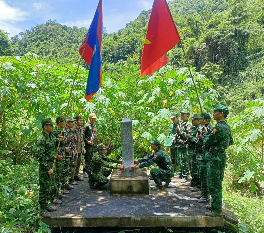 Vietnamese border posts and Lao units patrol to protect border markers